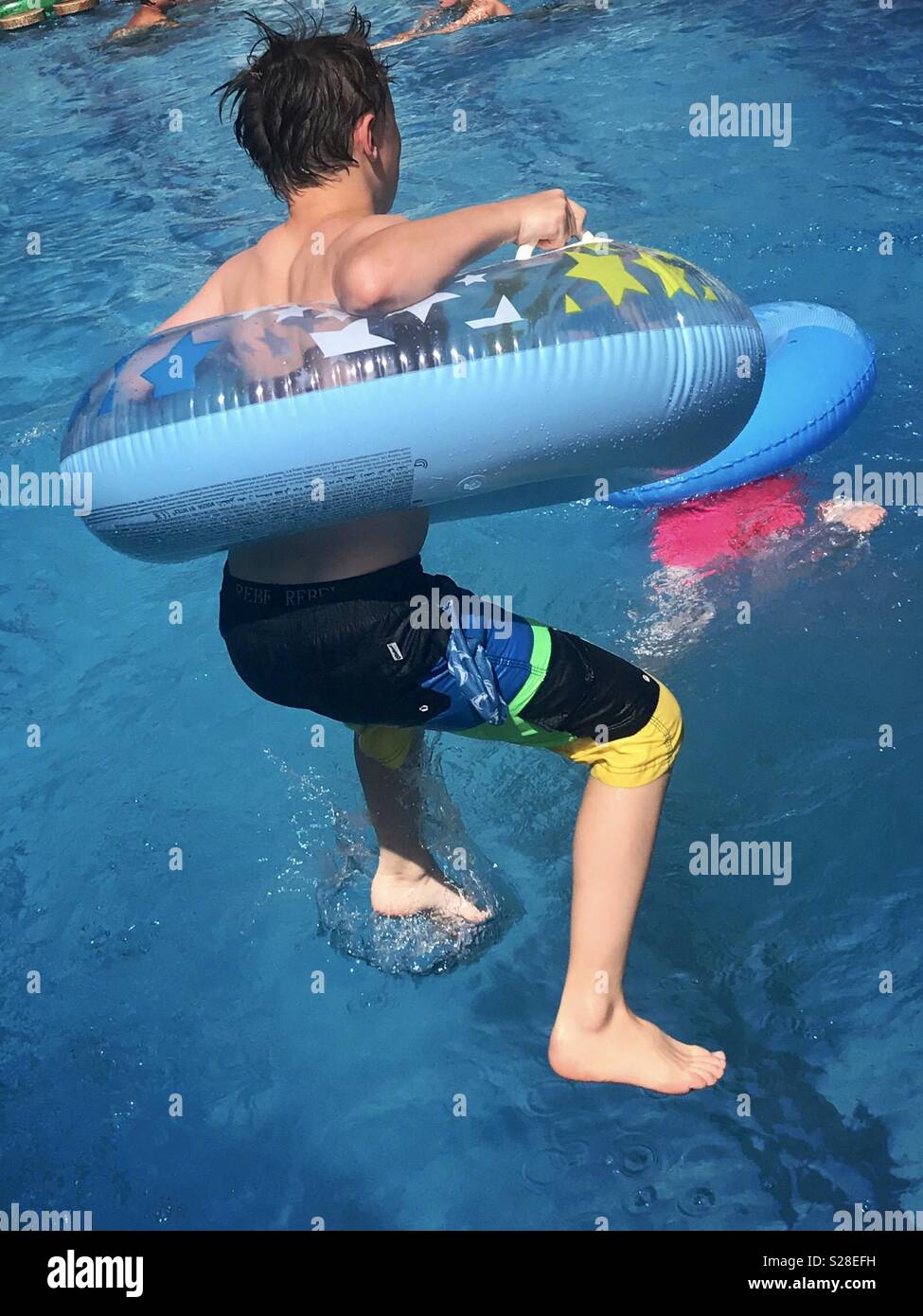 Jumping in a pool hi-res stock photography and images - Alamy