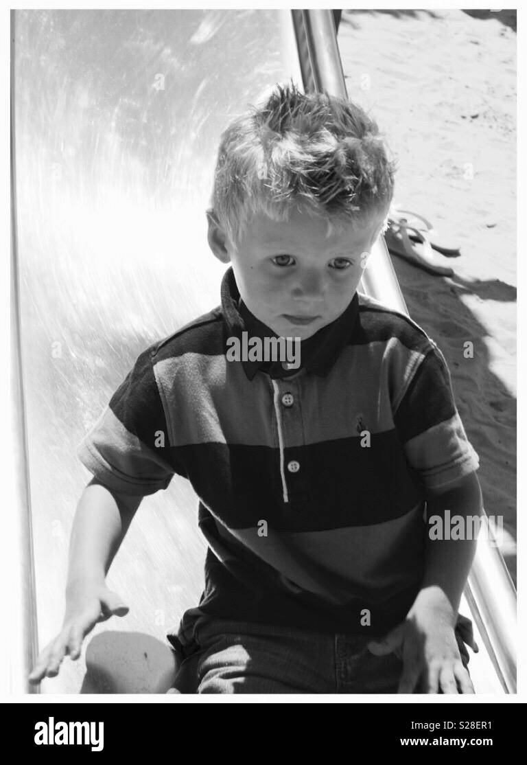 Going down the slide hi-res stock photography and images - Alamy
