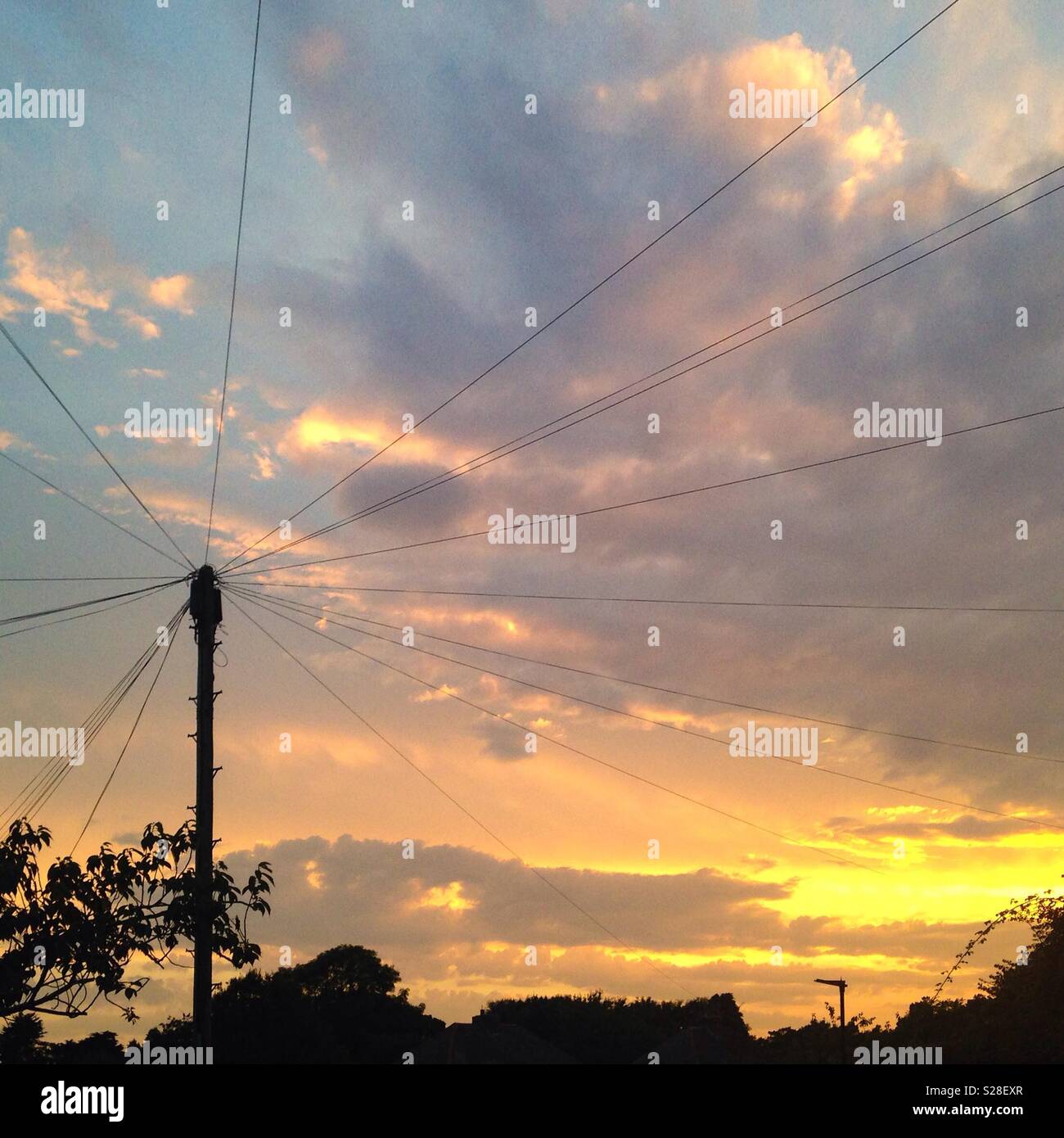 Sunset and Telegraph Pole Stock Photo - Alamy