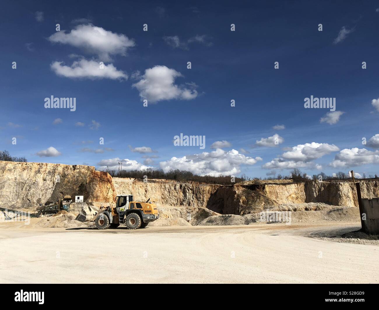 Heavy machinery in quarry Stock Photo - Alamy