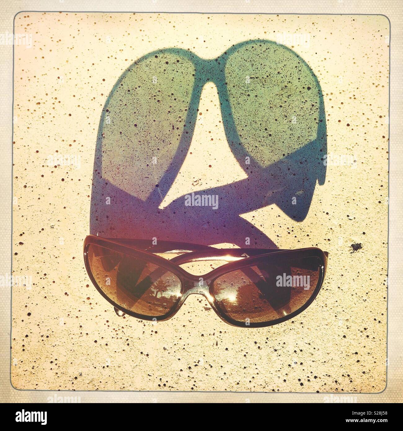 Flat lay picture of sunglasses with shadow on clear background. Summer ...