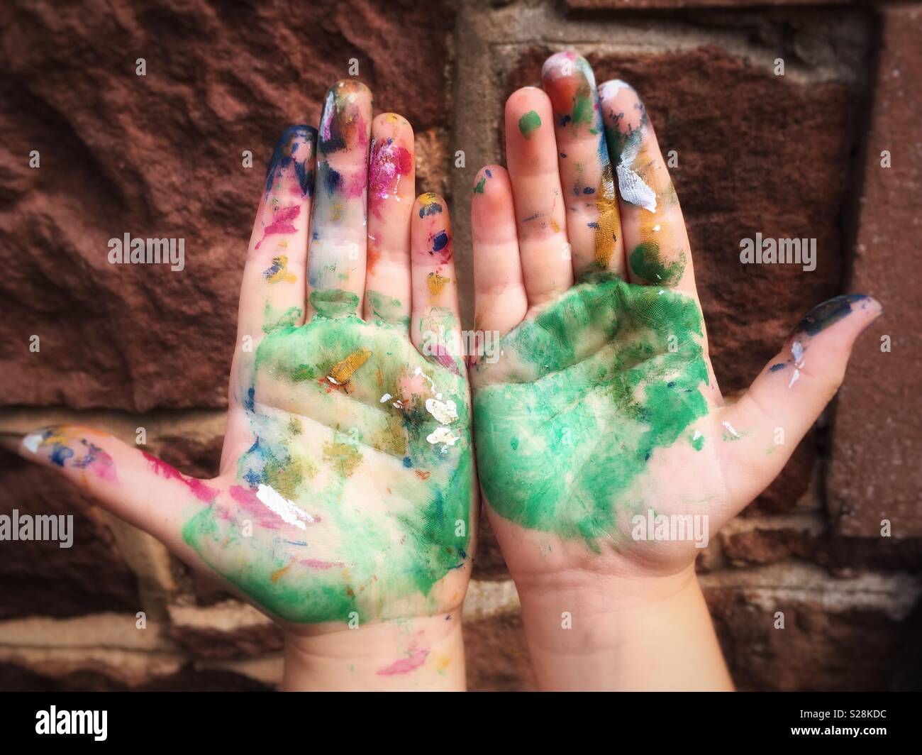 Child’s paint covered hands Stock Photo - Alamy
