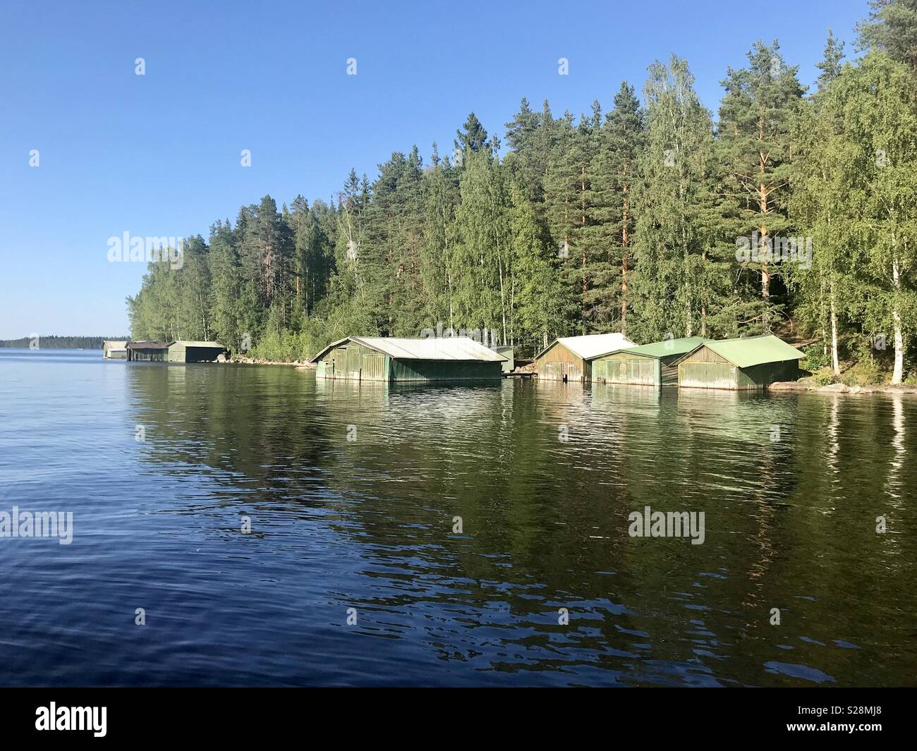 Boat huts on lake Saimaa. Imatra, Finland Stock Photo - Alamy