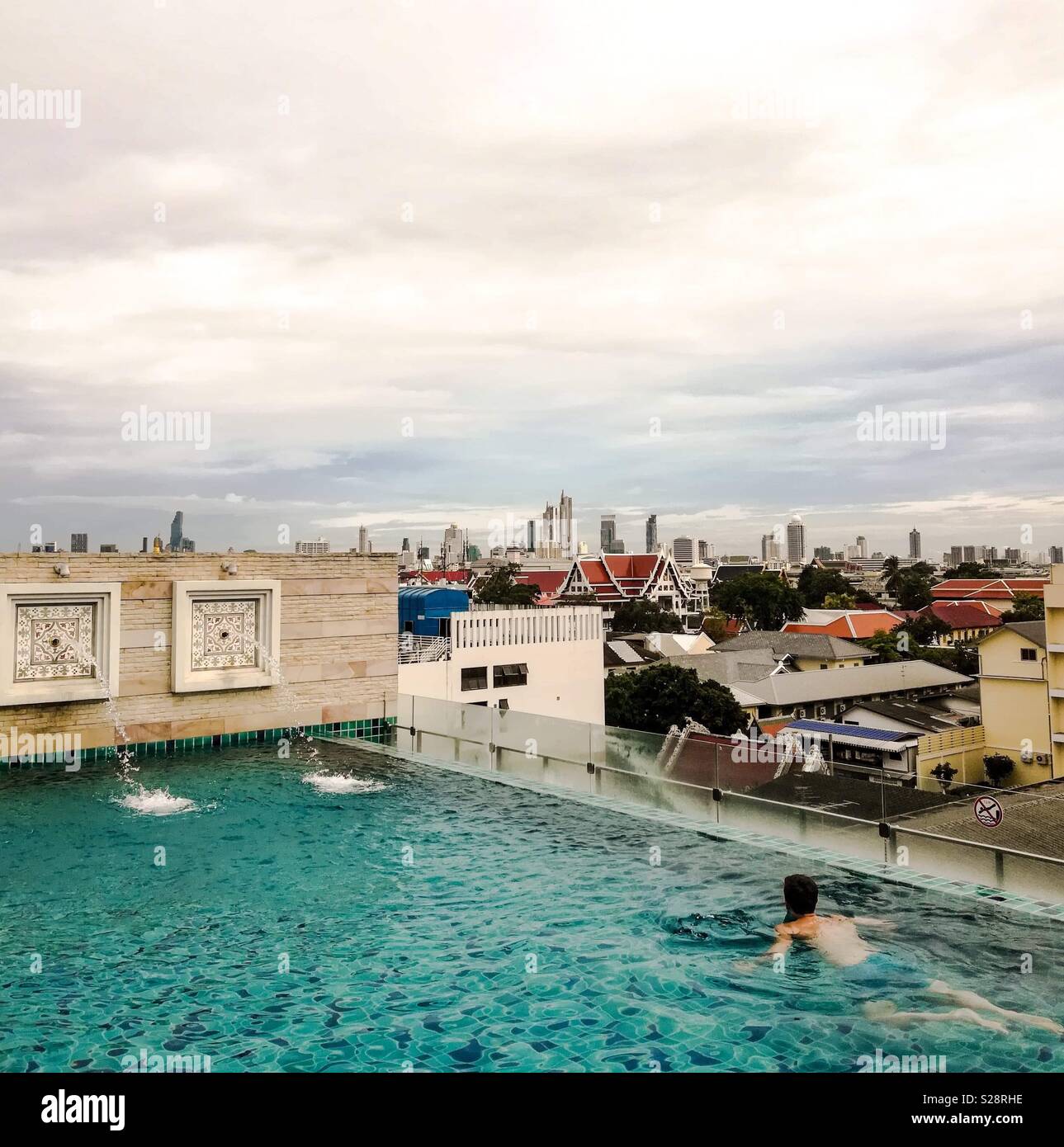 Infinity pool in chillax resort, Bangkok, Thailand Stock Photo - Alamy