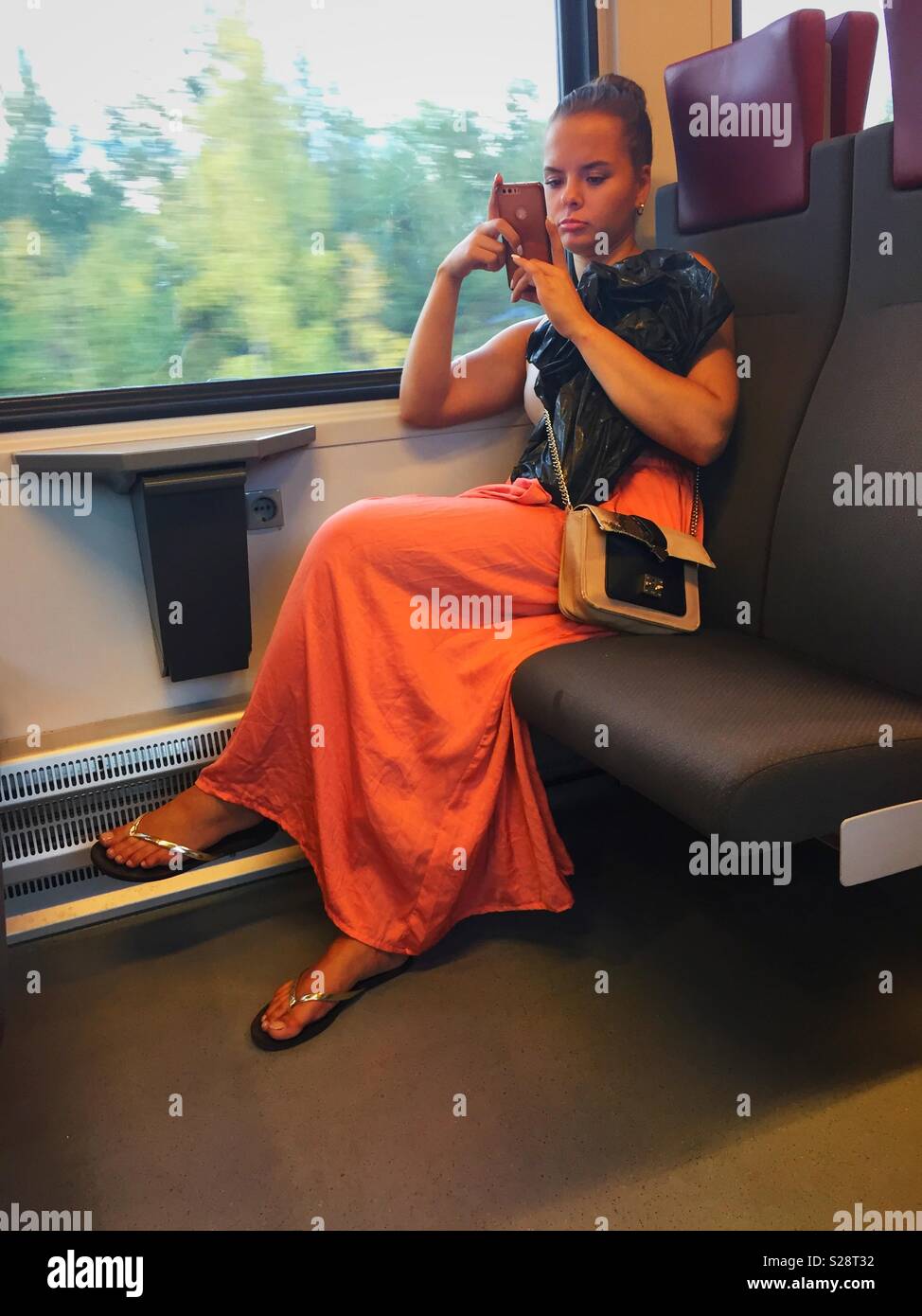Beautiful Young Lady at Commuter Train Stock Photo - Alamy