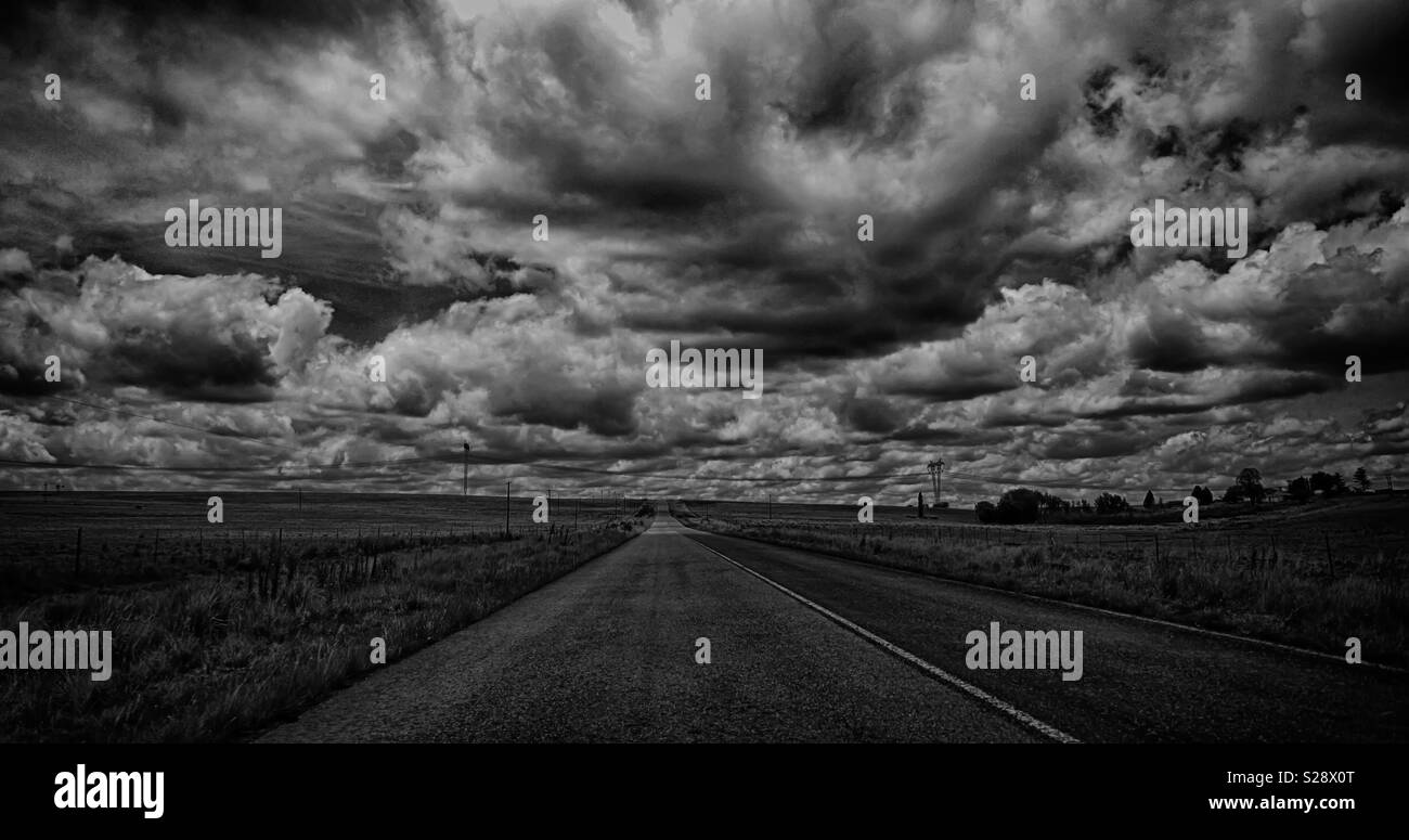 Black and white landscape with road and clouds hi-res stock photography ...