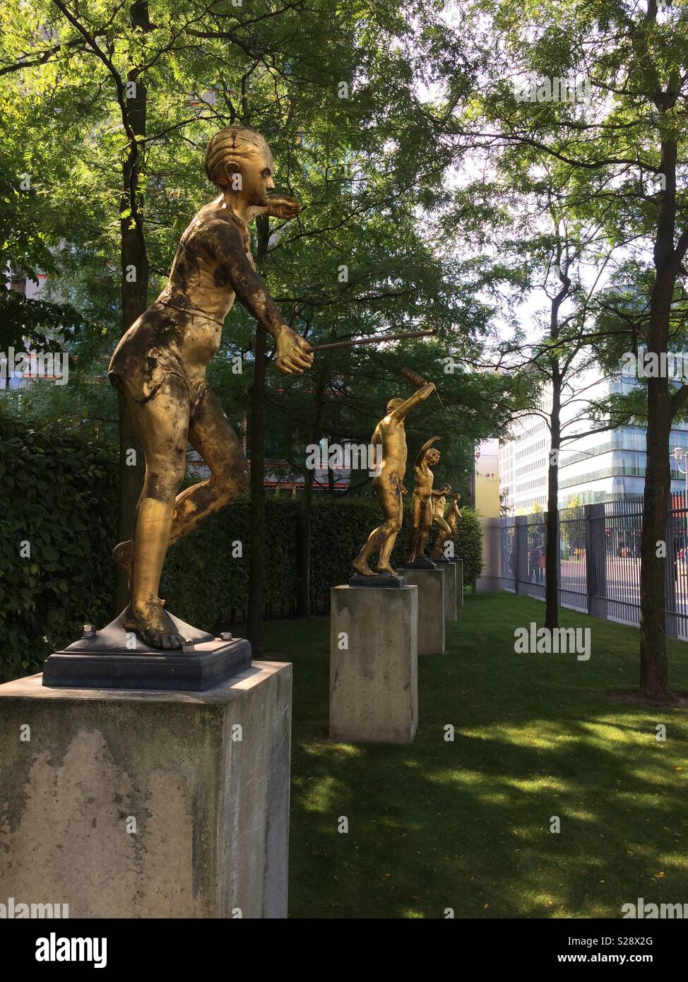 Golden statues Berlin Stock Photo - Alamy