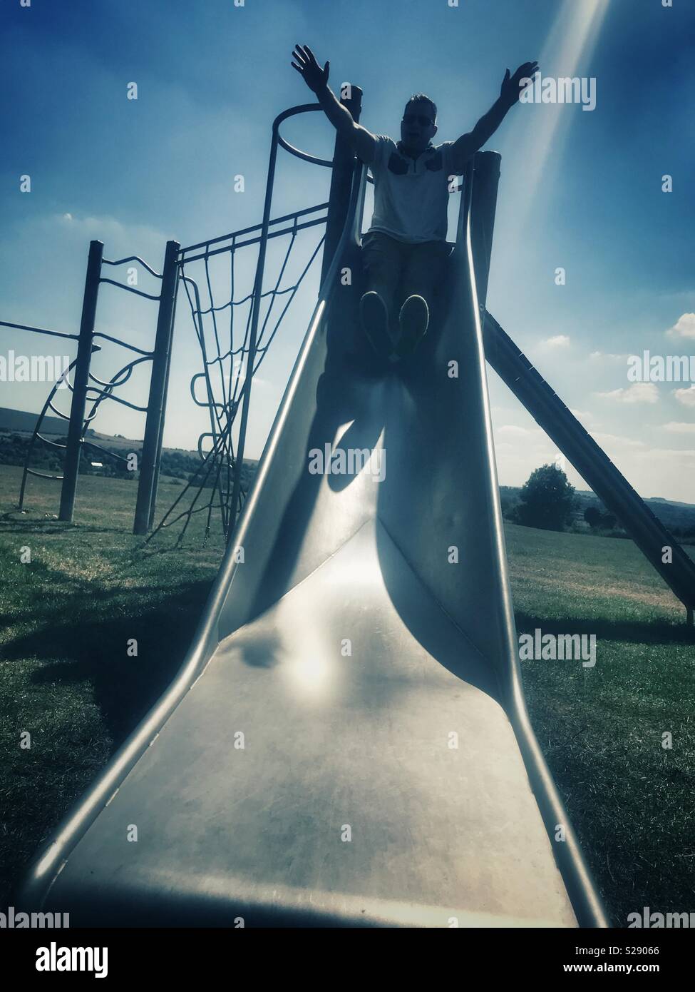 Going Down The Slide Stock Photos & Going Down The Slide Stock Images ...