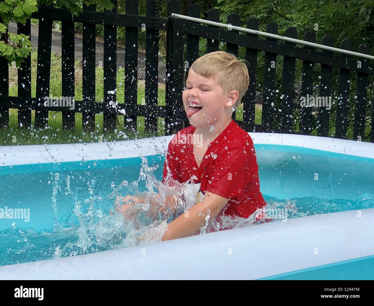 Boy water splash hi-res stock photography and images - Alamy