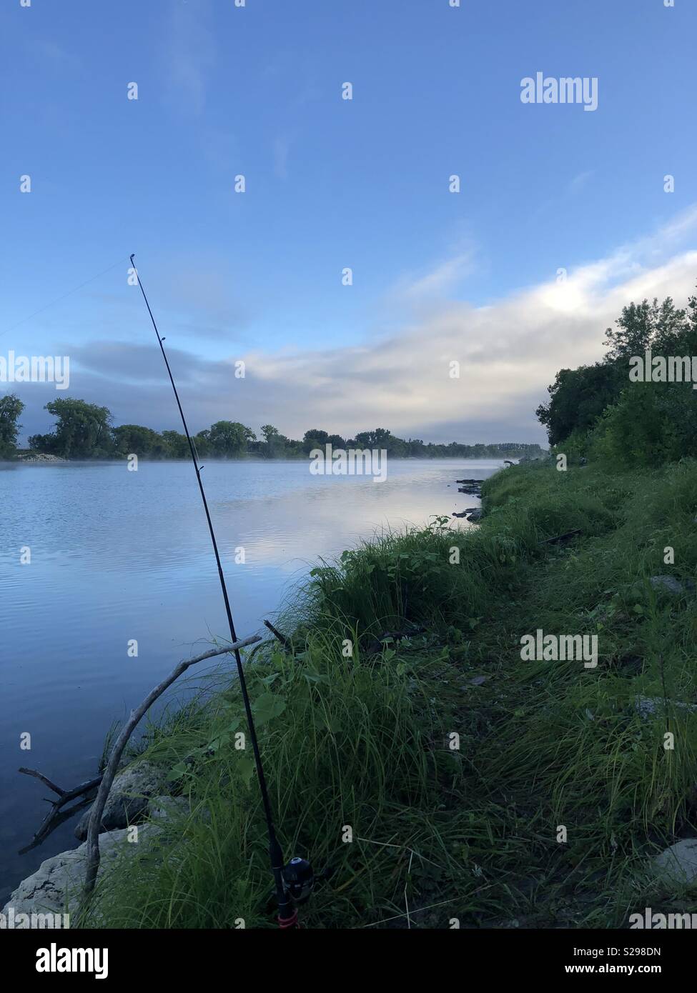 Early morning fishing Stock Photo - Alamy