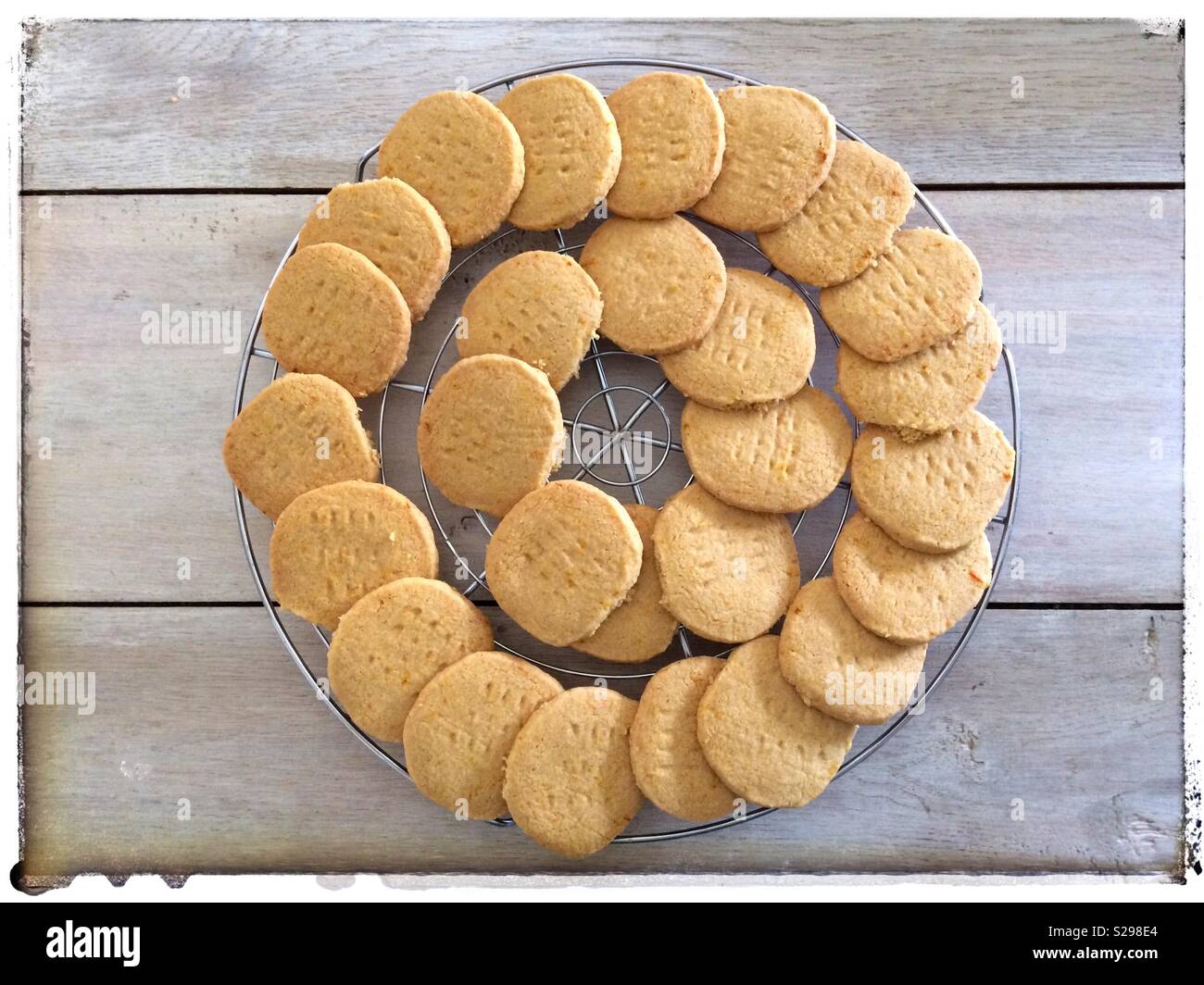 Ginger biscuits on wooden hi-res stock photography and images - Alamy