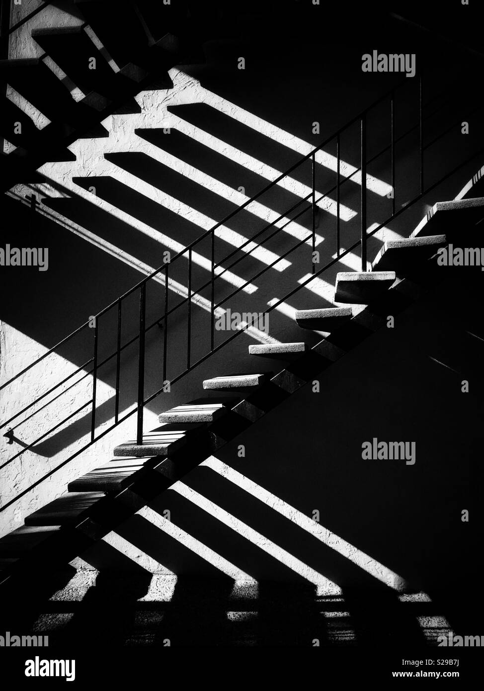 The Apt. Stairs and shadows Stock Photo - Alamy