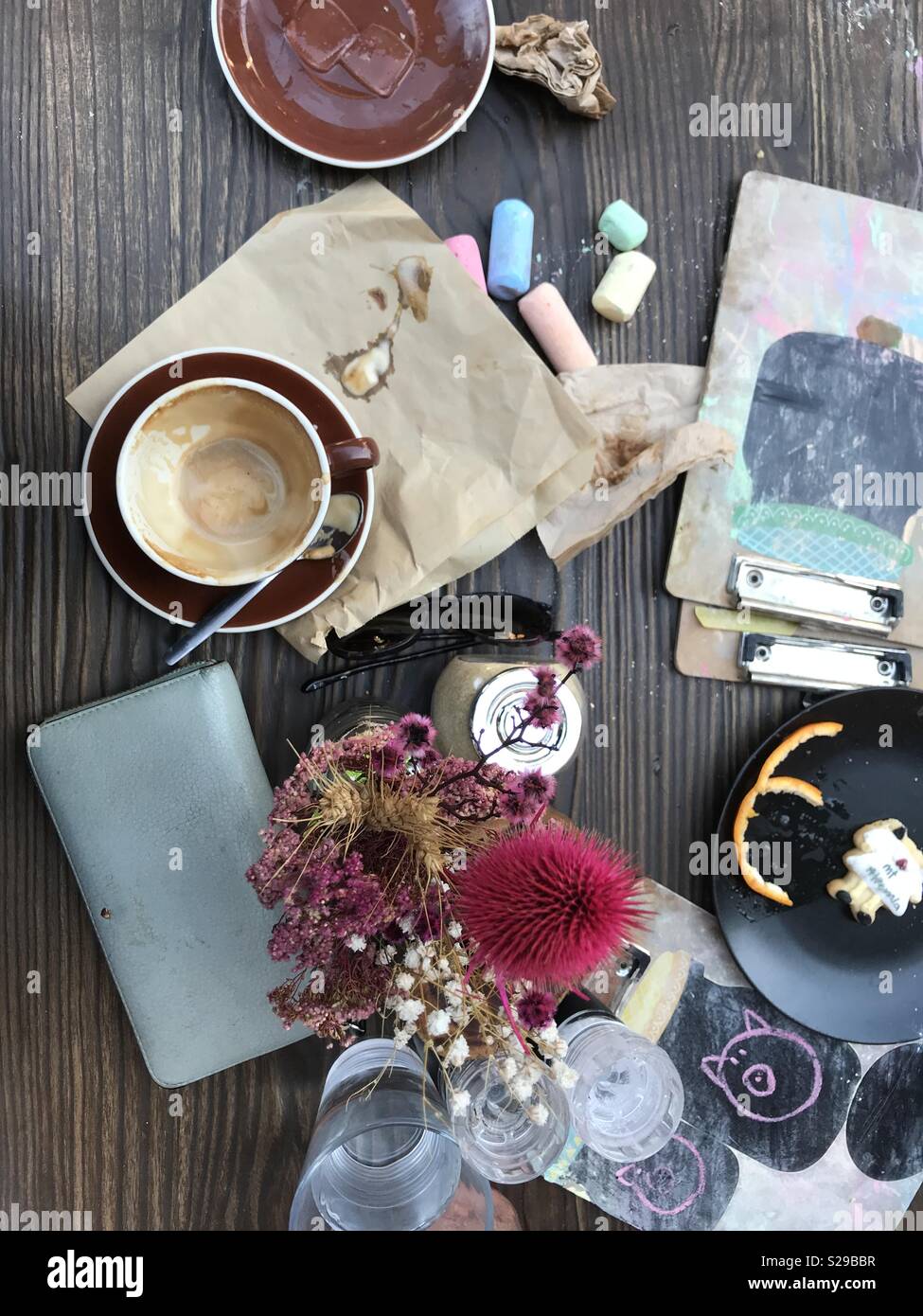 Messy kids breakfast cafe Stock Photo - Alamy
