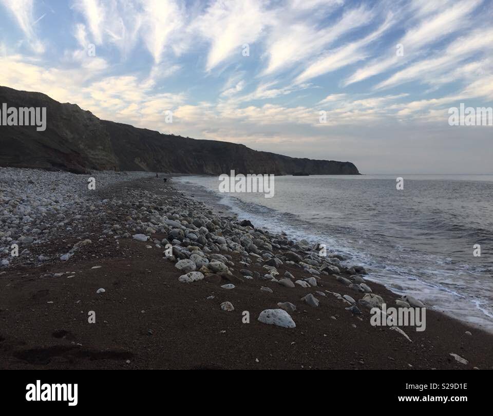 Black sand and pebbles Stock Photo - Alamy