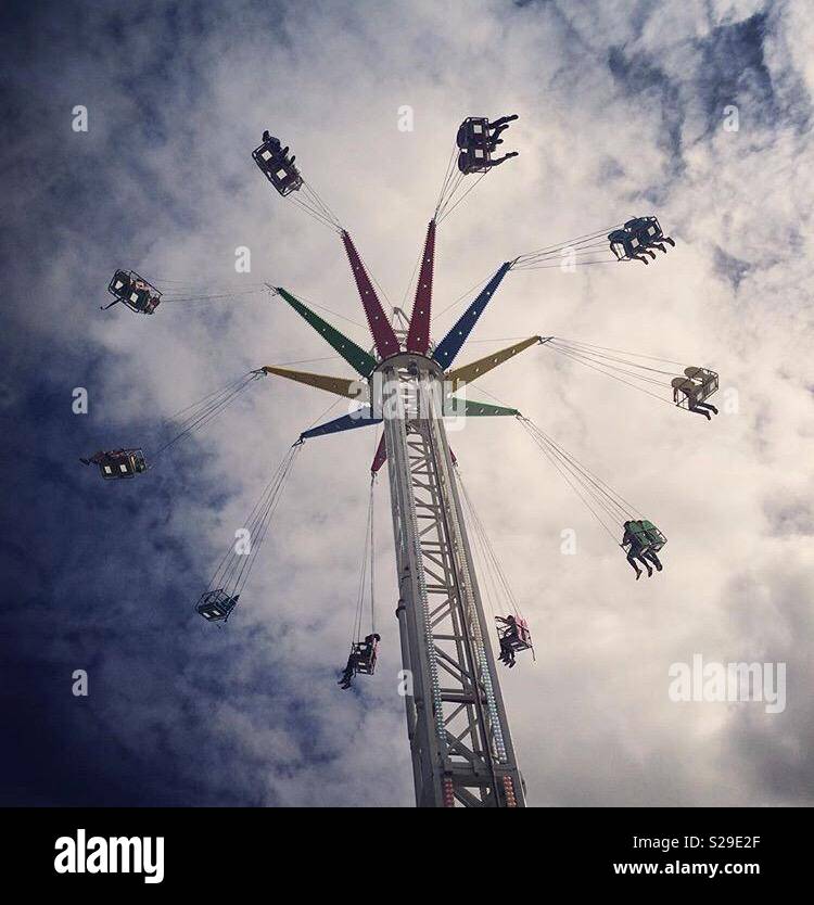 High swing at a fair Stock Photo - Alamy