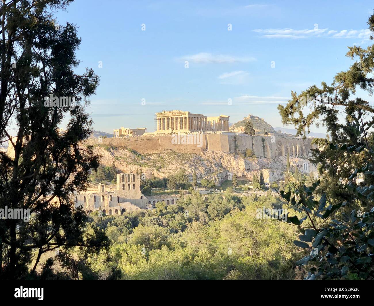 Acropolis in Athens, Greece, with trees either side Stock Photo - Alamy