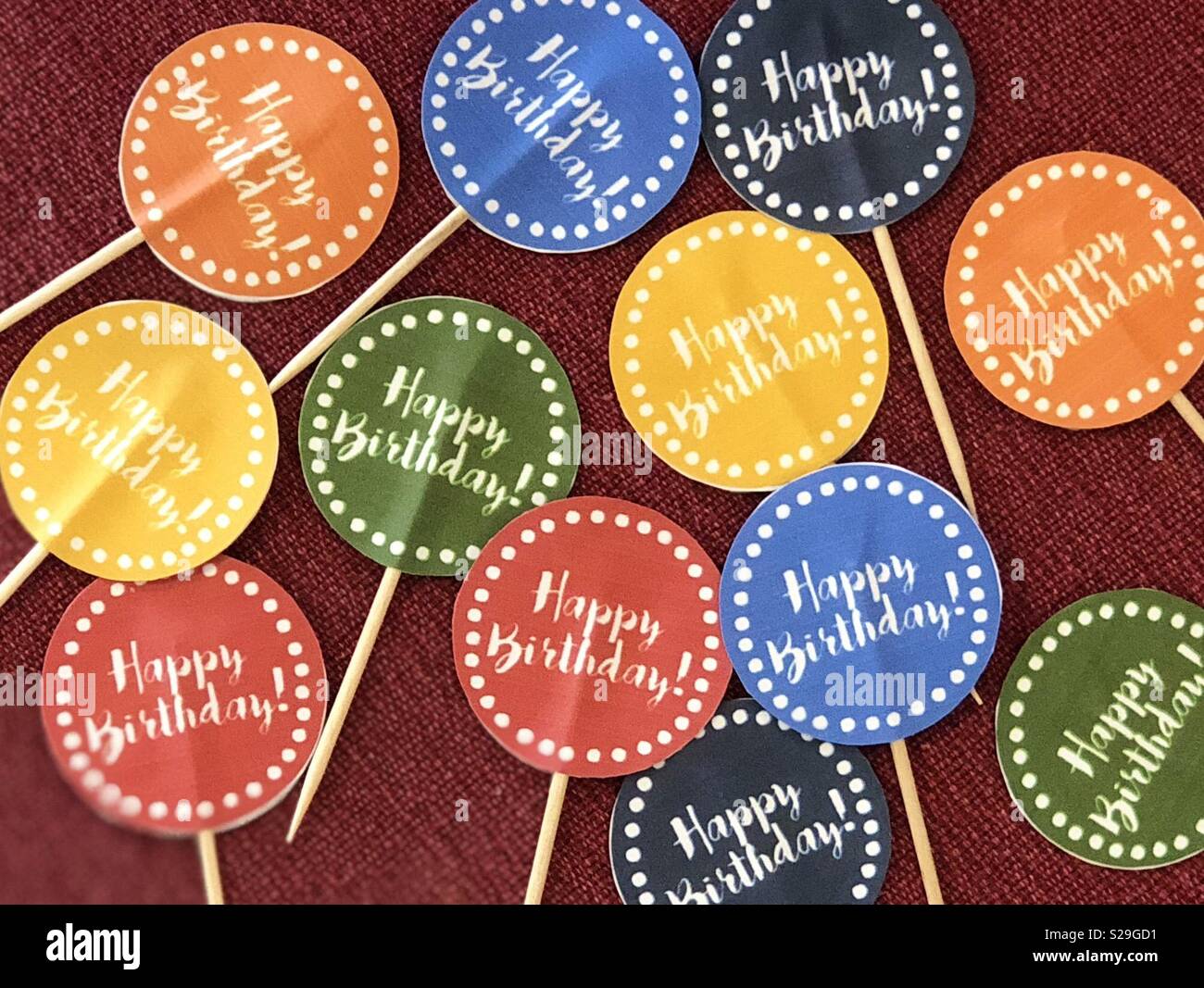 Colorful cupcake toppers Stock Photo - Alamy