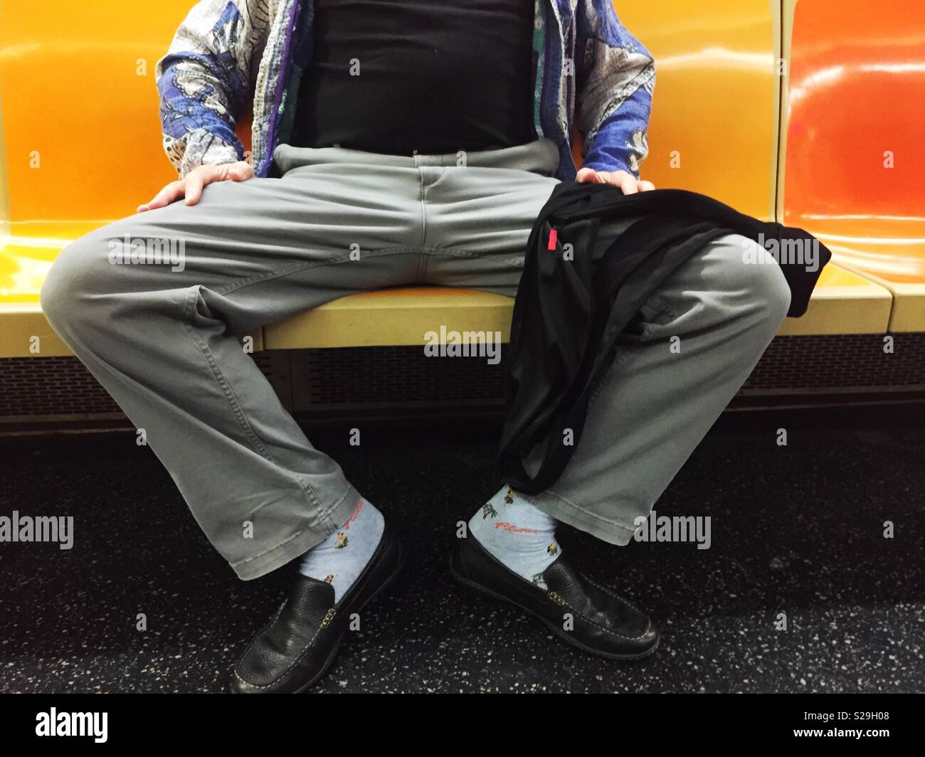 Manspreading hi-res stock photography and images - Alamy
