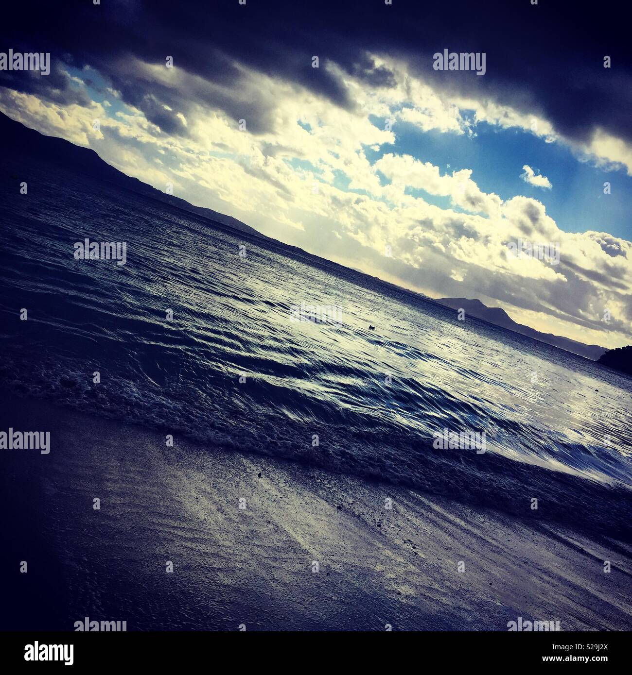Overcast clouds and ocean hi-res stock photography and images - Alamy