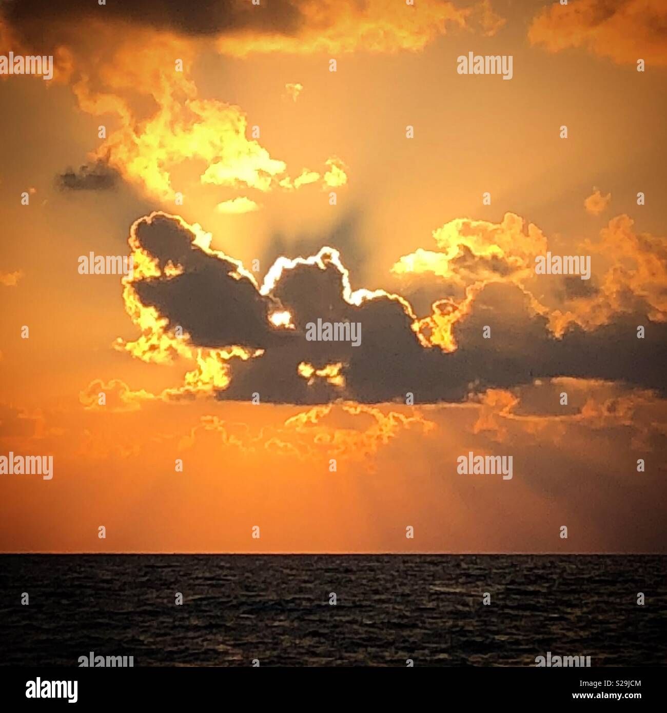 An epic sunset on the beach Stock Photo - Alamy