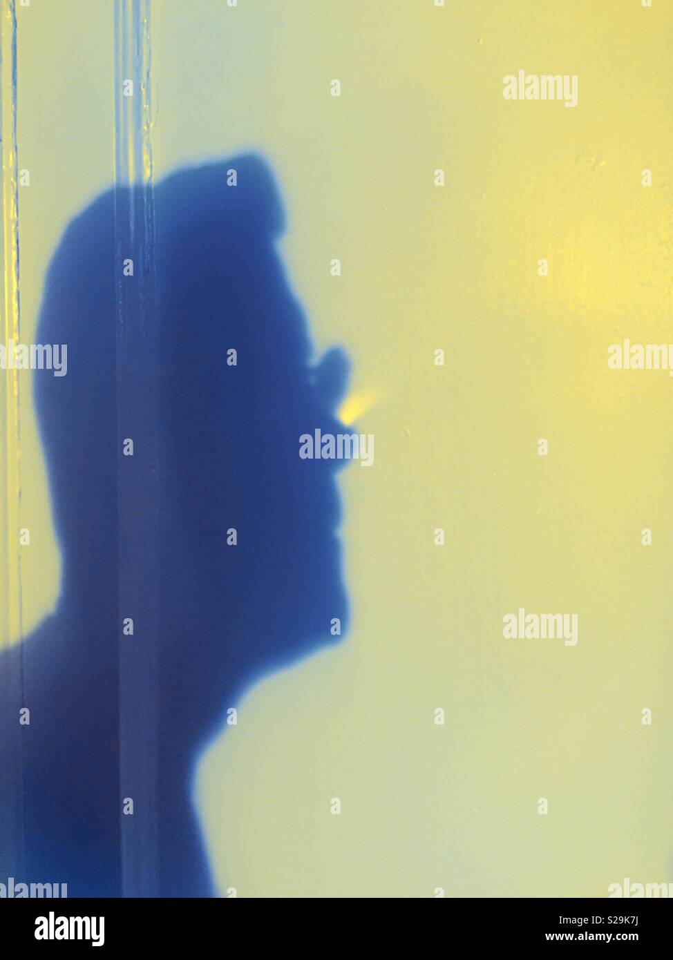 Shadow of a man wearing eyeglasses Stock Photo - Alamy