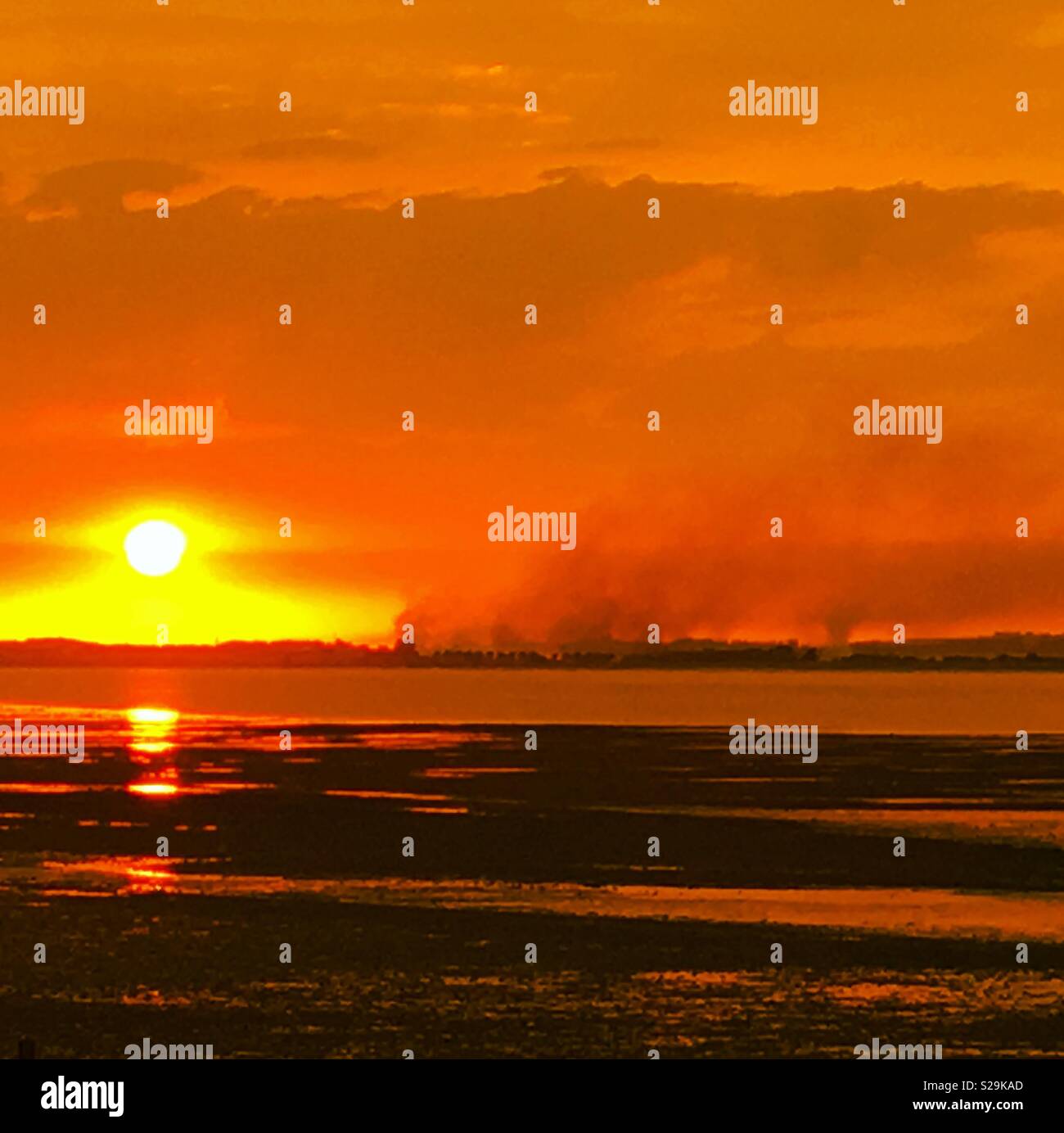Sunset in Kent, orange sky down at the beach Stock Photo - Alamy