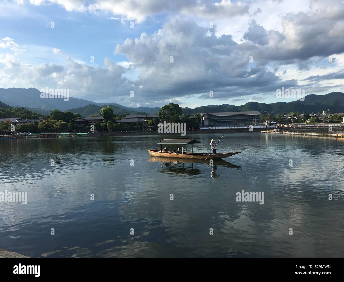 Traditional boating in a lake Stock Photo - Alamy