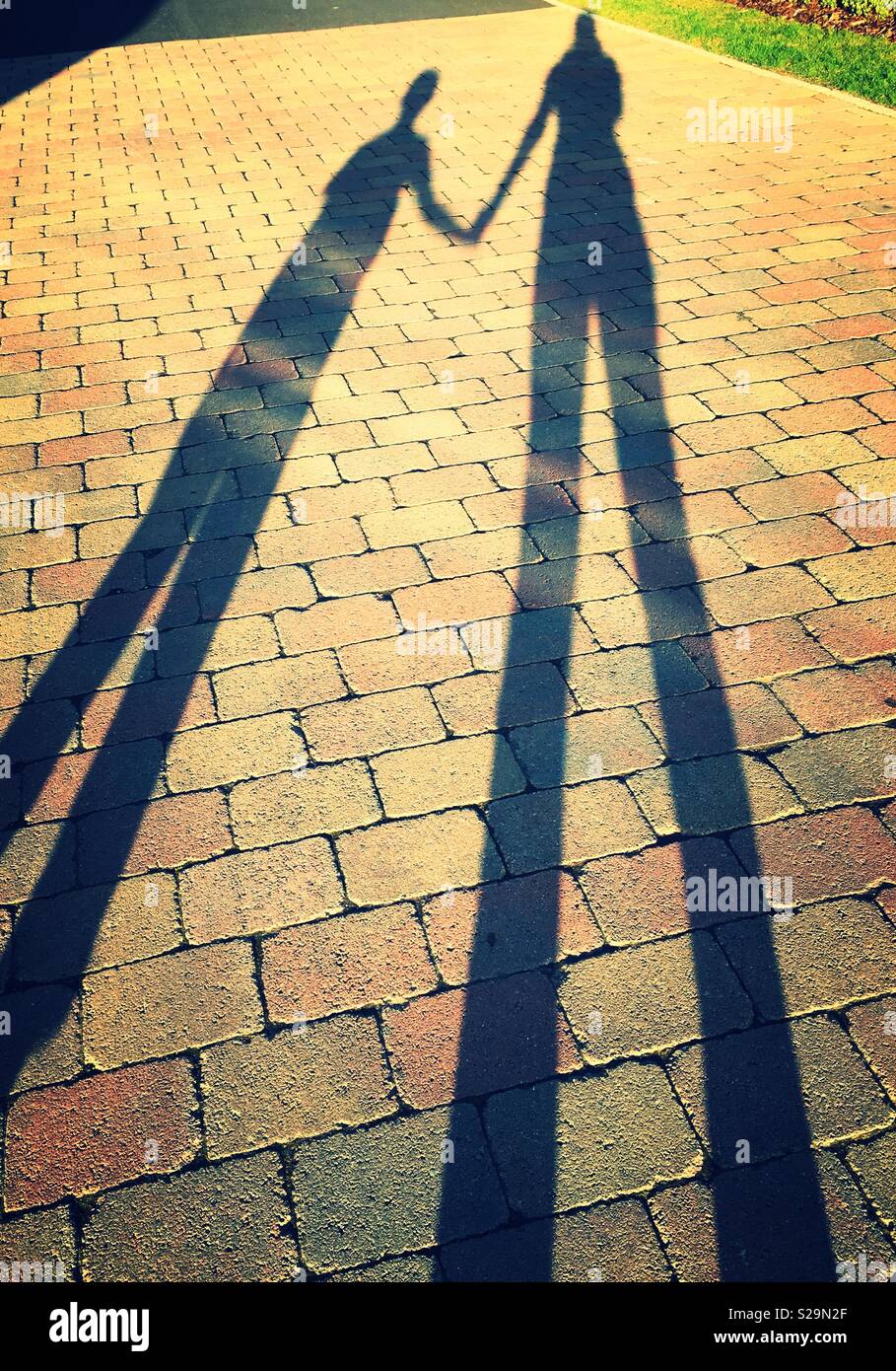 Mother son shadows hi-res stock photography and images - Alamy
