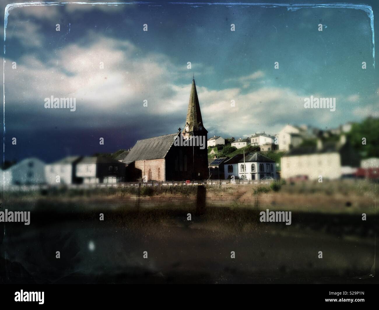 Harbour side church Stock Photo - Alamy