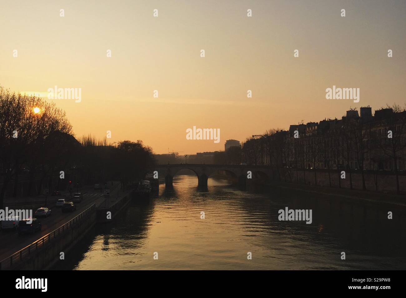 Sunset over the Seine in Paris Stock Photo - Alamy