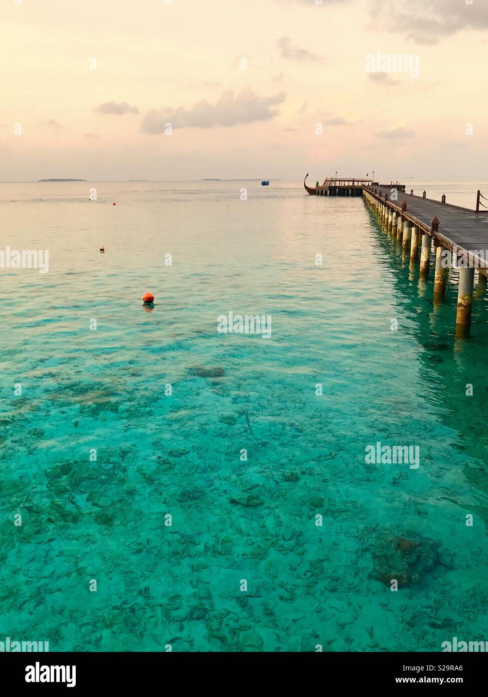 Jetty in the beautiful Maldives Stock Photo - Alamy