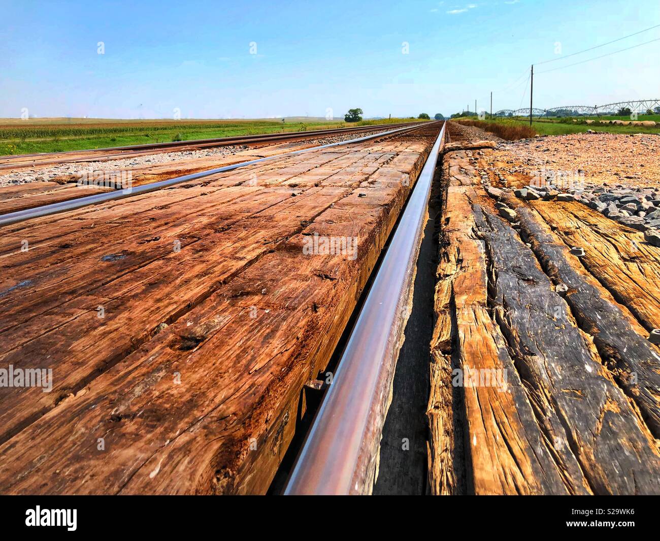 Train track rails with distance perspective Stock Photo - Alamy