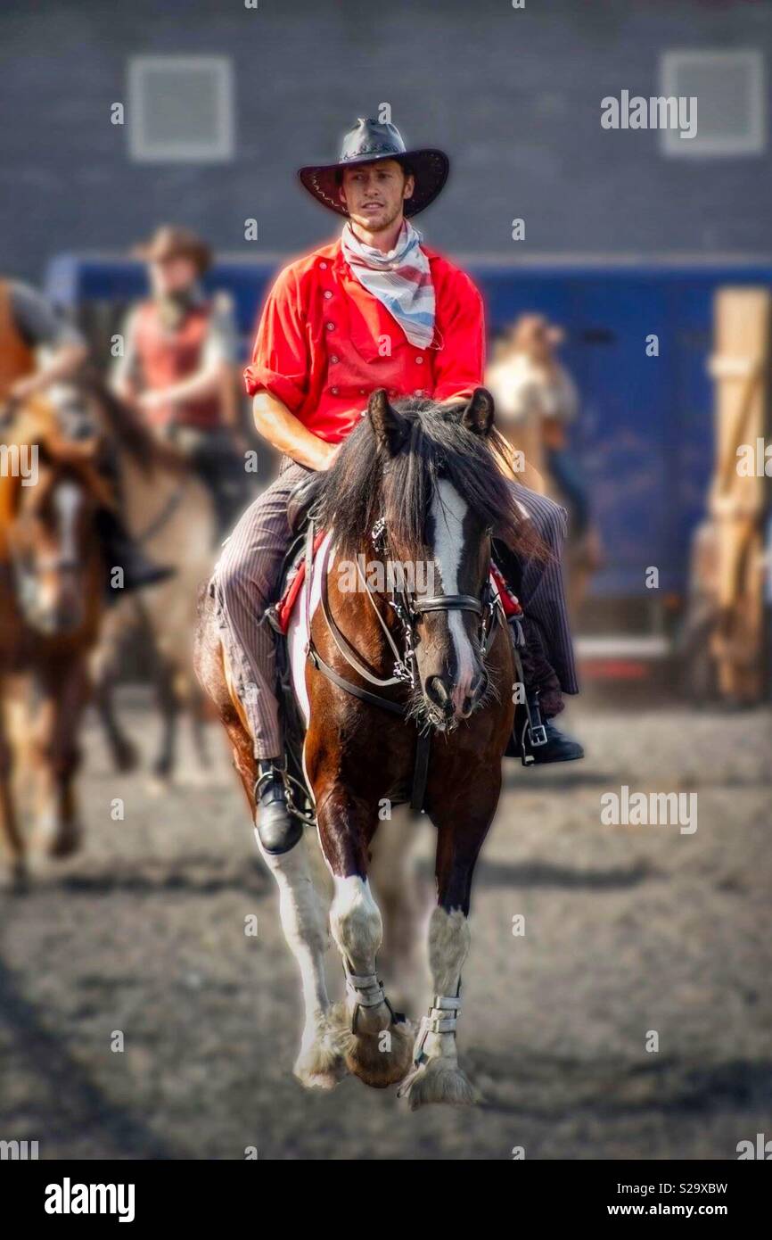 Cowboy rider on horseback Stock Photo - Alamy