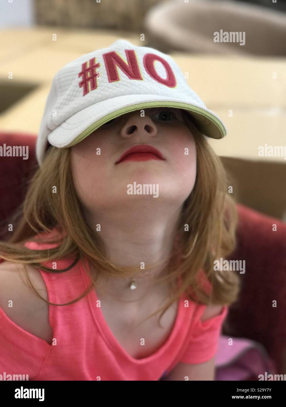 Young girl wearing #no cap Stock Photo - Alamy