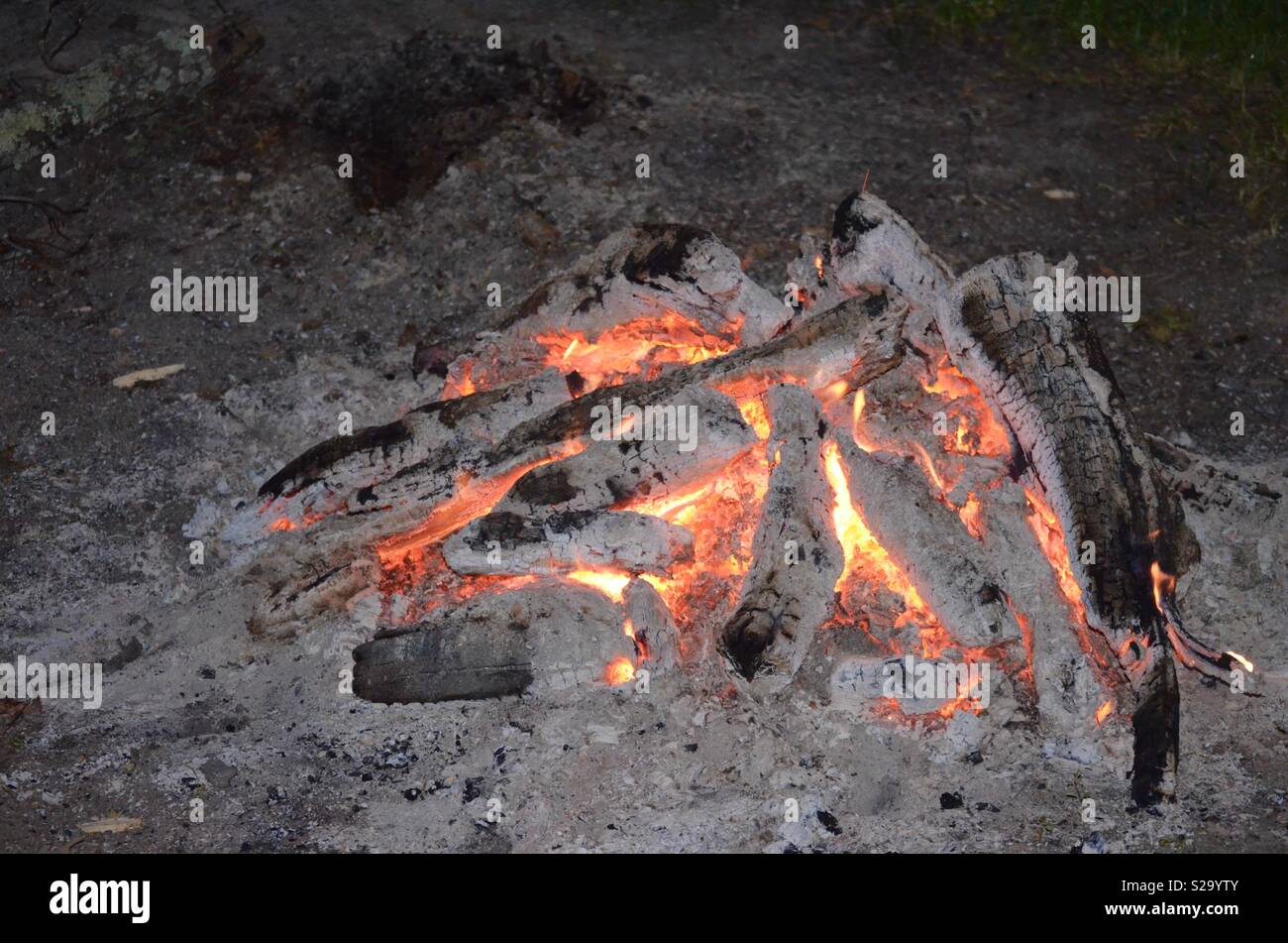 Small campfire at night Stock Photo - Alamy