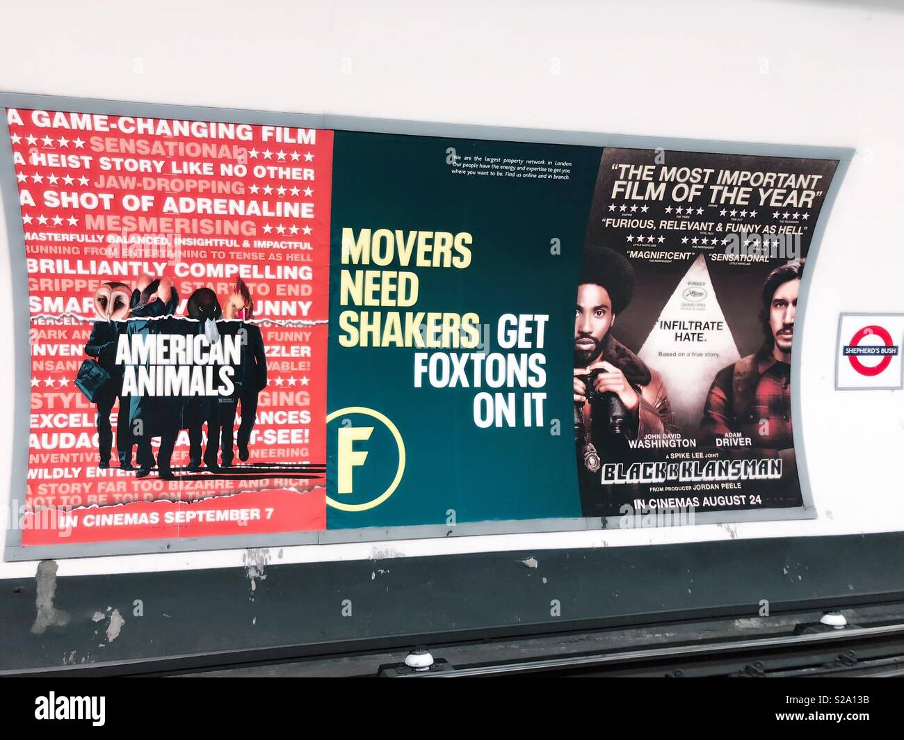 Movie poster on the tube Stock Photo - Alamy