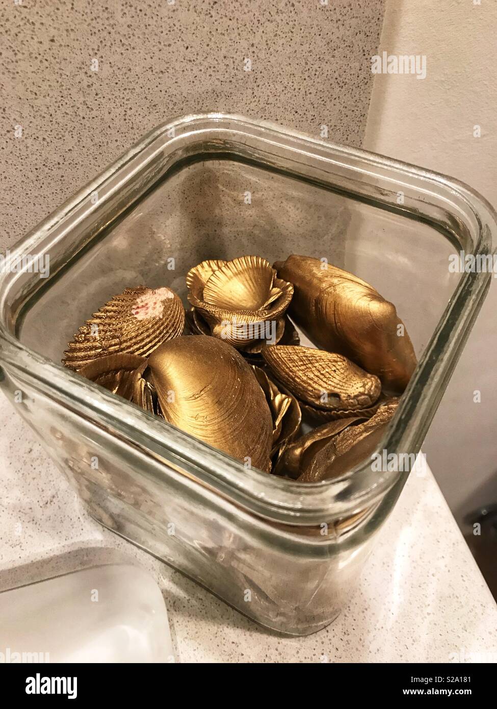 Gold shells hi-res stock photography and images - Alamy