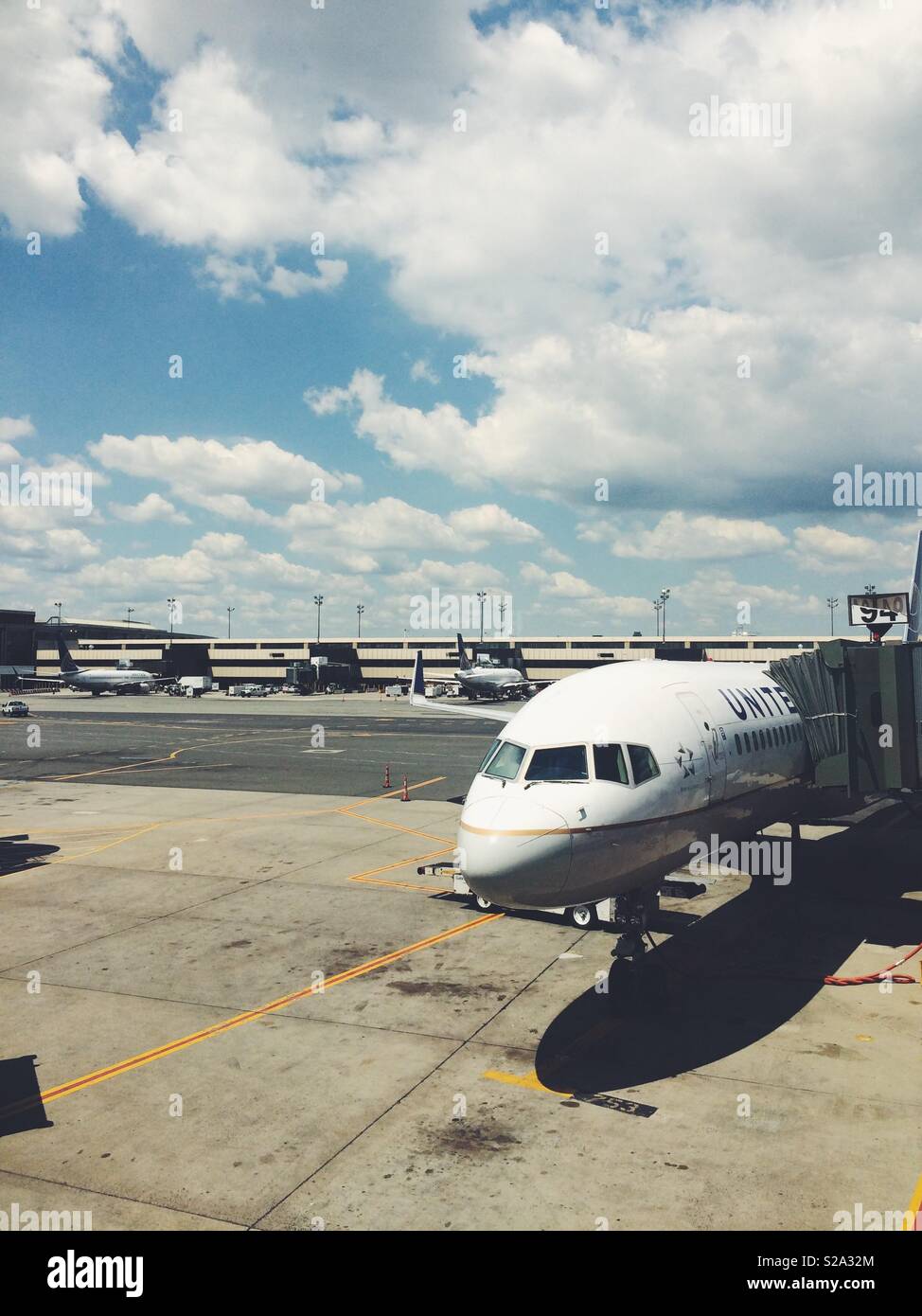 Airplane sitting at tarmac Stock Photo - Alamy