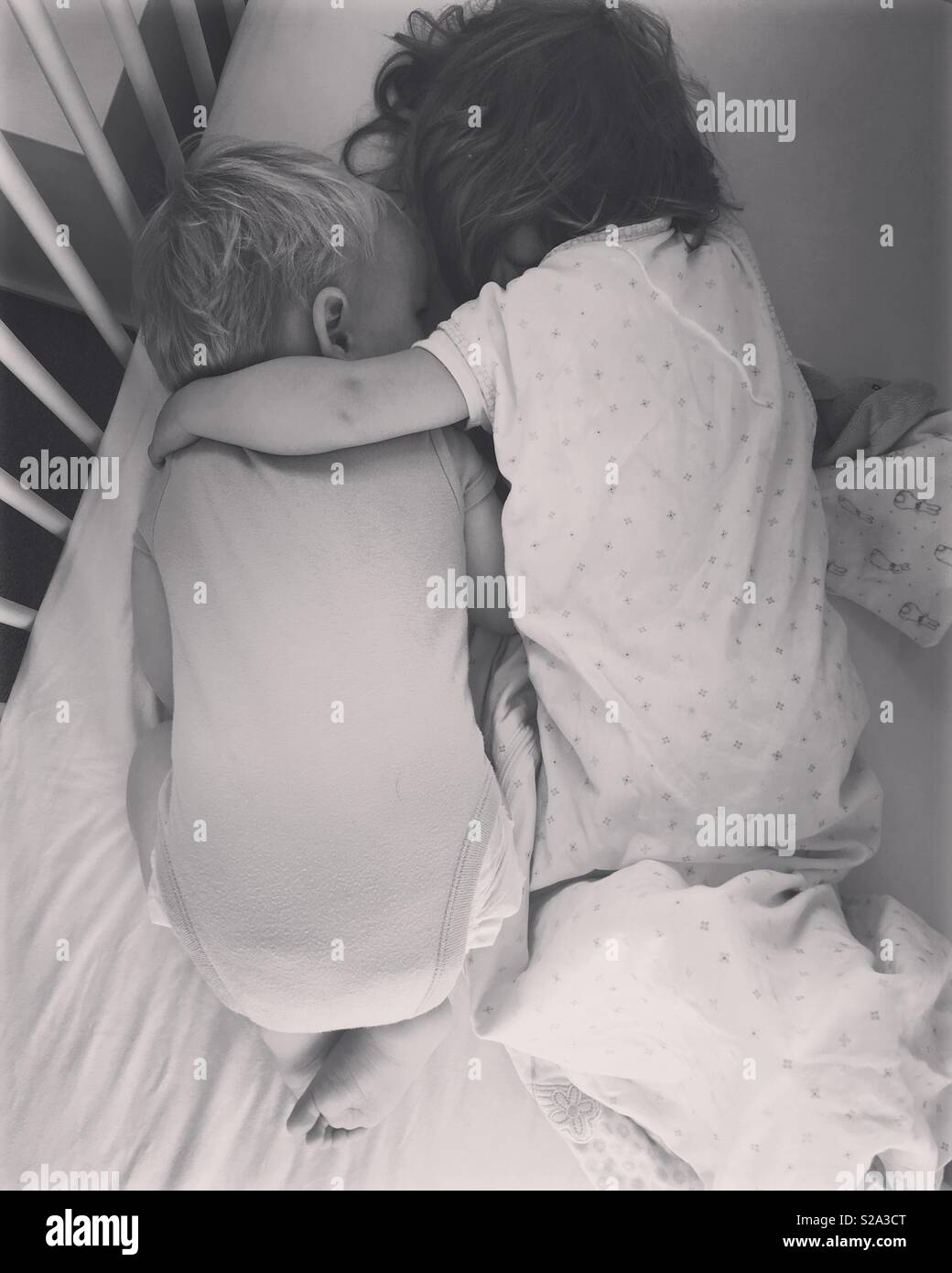 Cuddle cot hi-res stock photography and images - Alamy