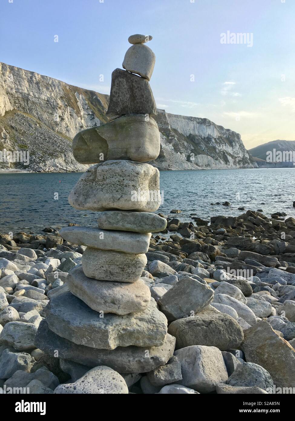 Mupe Bay - stone stack on beach Stock Photo - Alamy