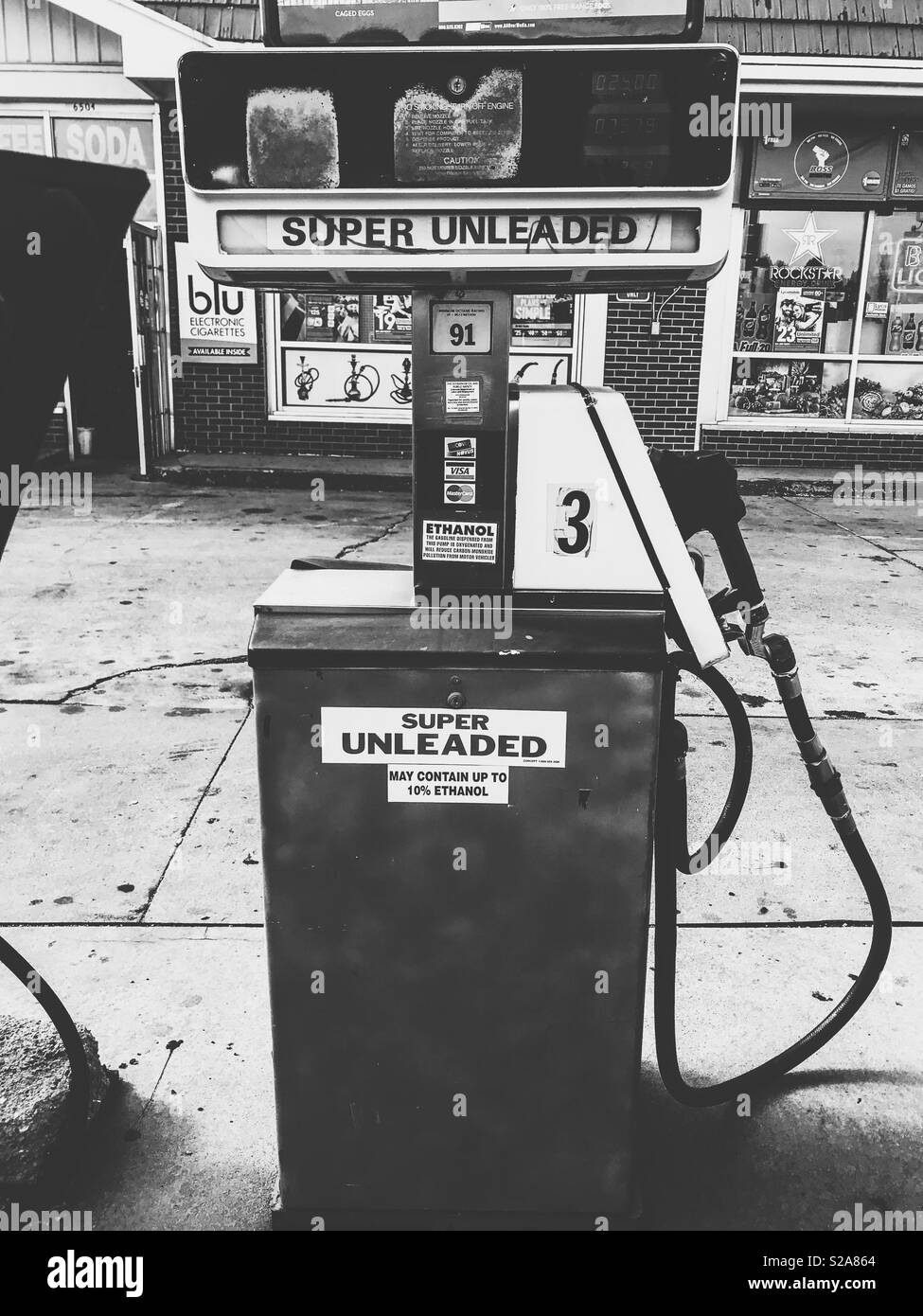 Old school gas station Stock Photo - Alamy