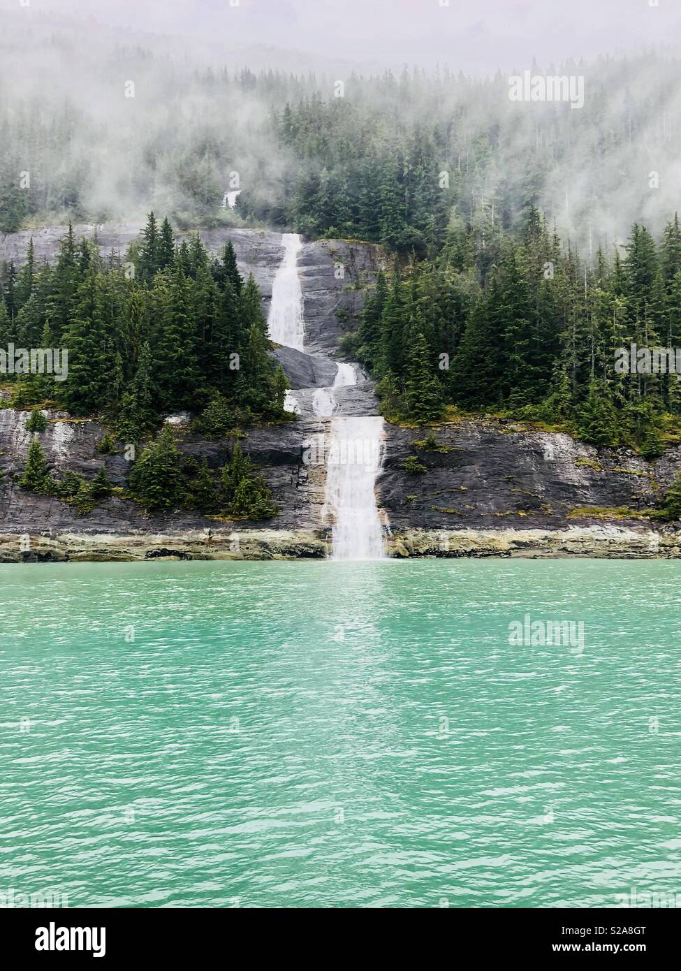 Beautiful waterfall in Alaska Stock Photo - Alamy