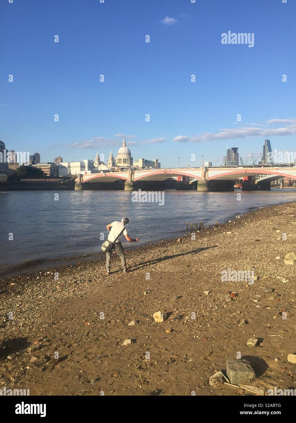 Man throwing a pebble hi-res stock photography and images - Alamy