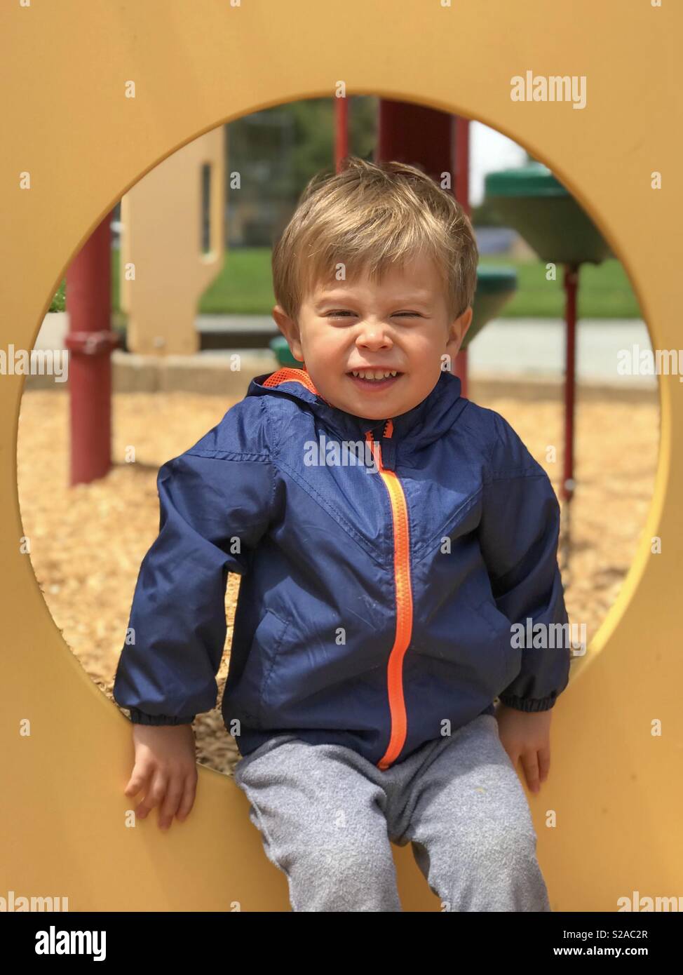 Boy squinting hi-res stock photography and images - Alamy