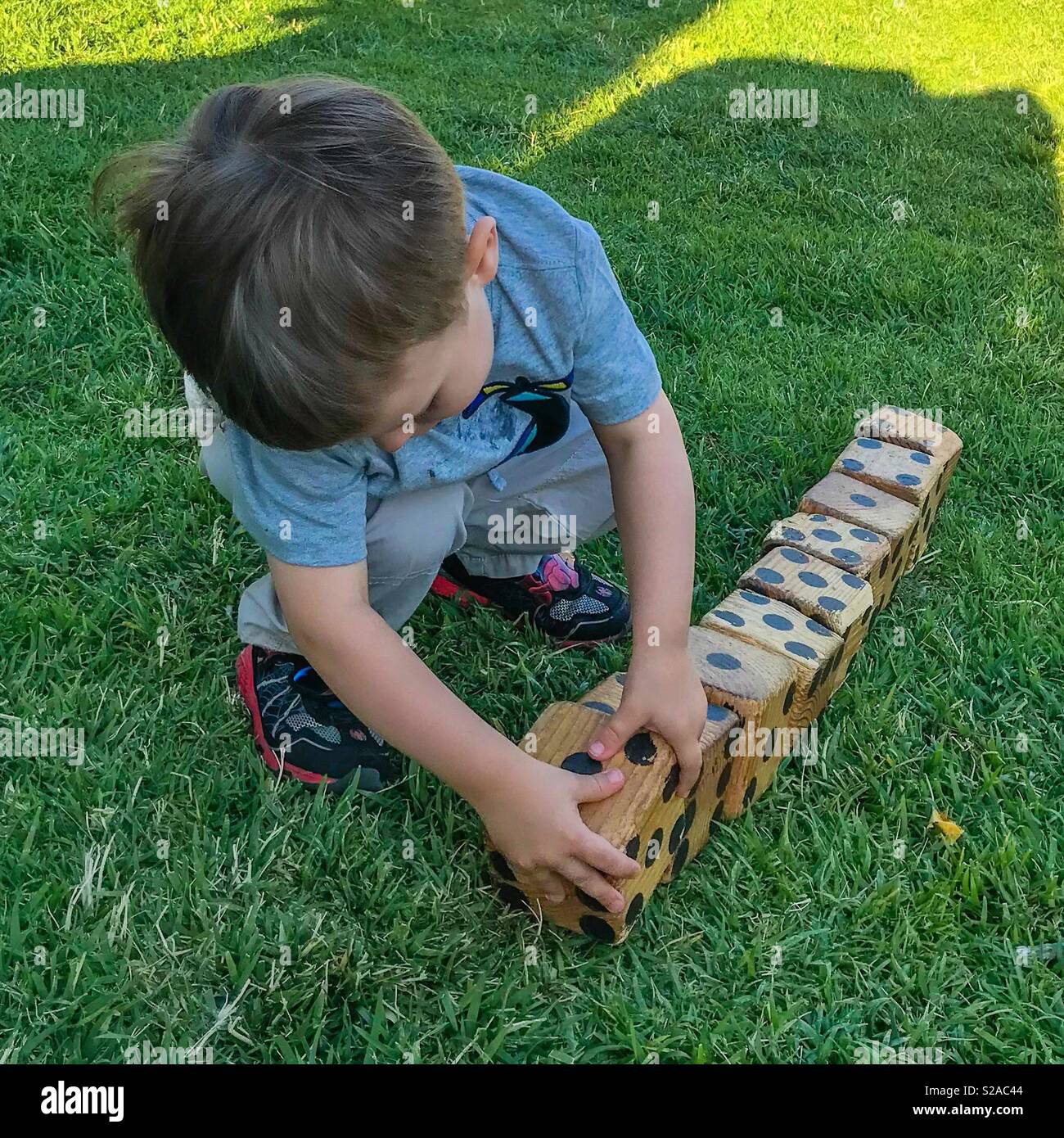 Boy Playing With Dice High Resolution Stock Photography and Images - Alamy