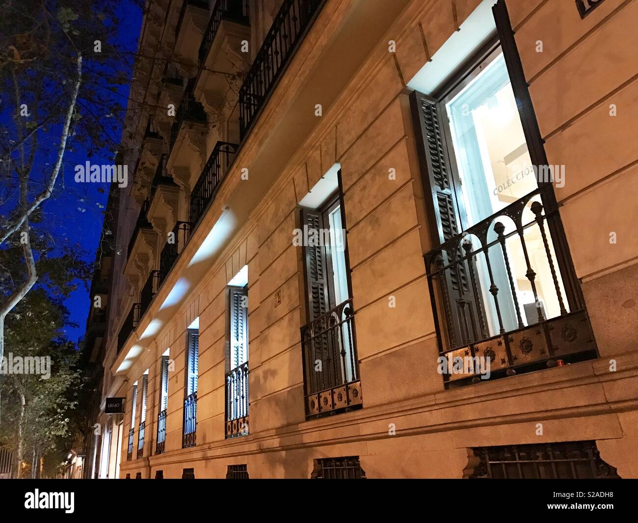 House facade with illuminated windows hi-res stock photography and ...