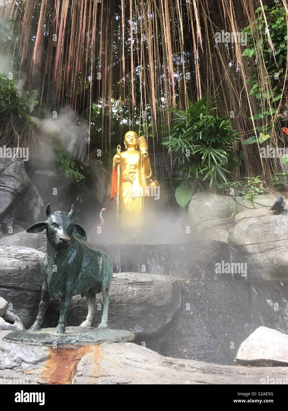 mystic statue at golden mountain Stock Photo - Alamy