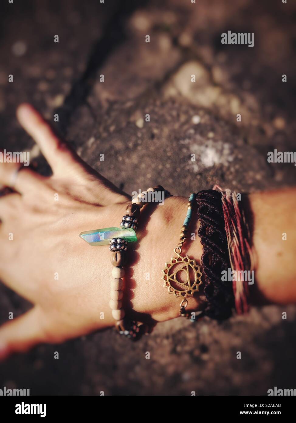 Hand with bracelets hi-res stock photography and images - Alamy