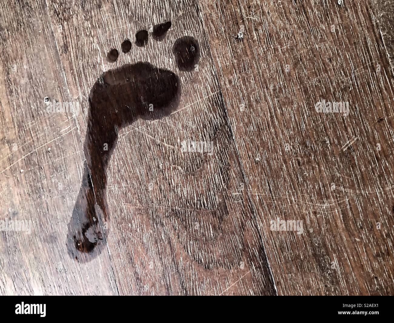 Footprint on wooden floor hi-res stock photography and images - Alamy