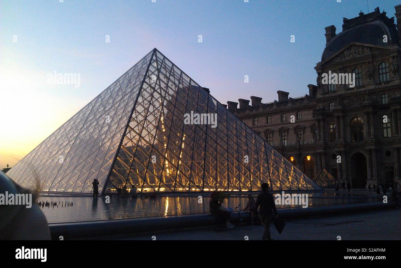 Louvre pyramid sunset hi-res stock photography and images - Alamy